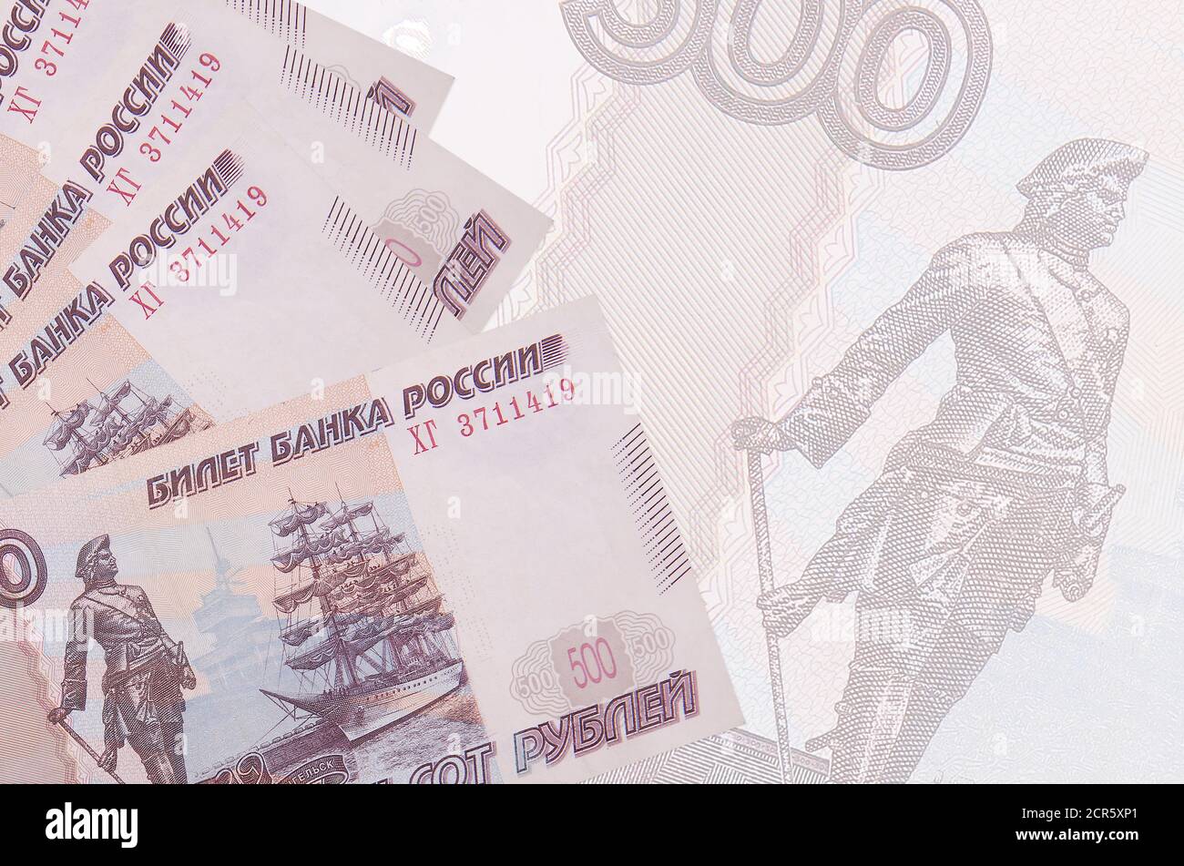 500 russian rubles bills lies in stack on background of big semi ...