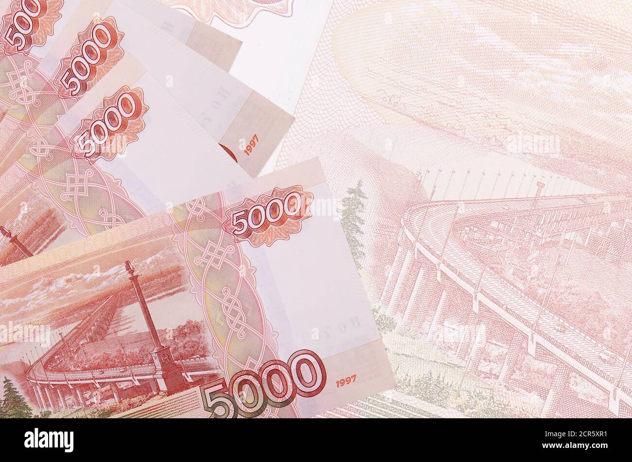 5000 russian rubles bills lies in stack on background of big semi ...