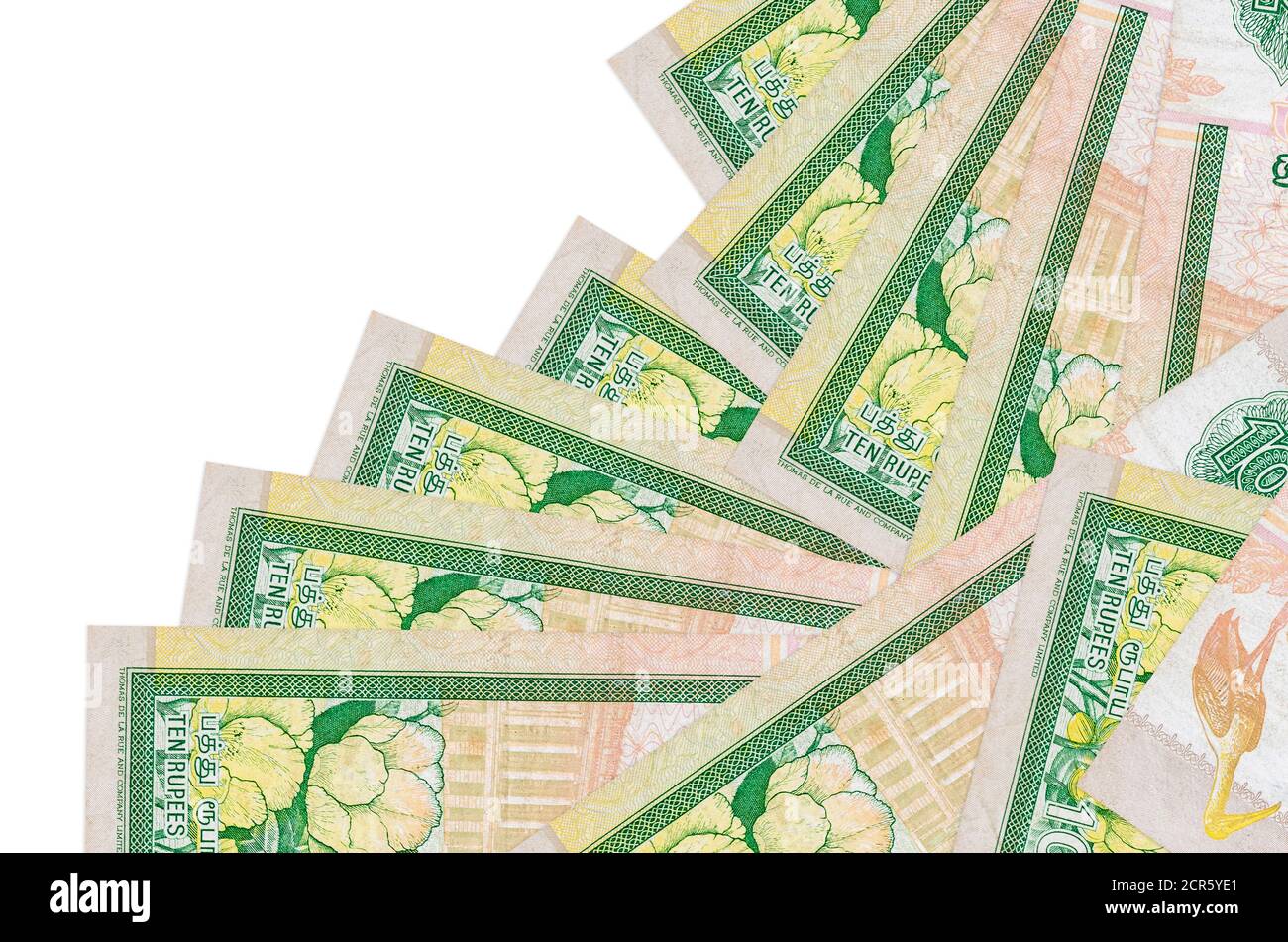 10 Sri Lankan rupees bills lies in different order isolated on white ...