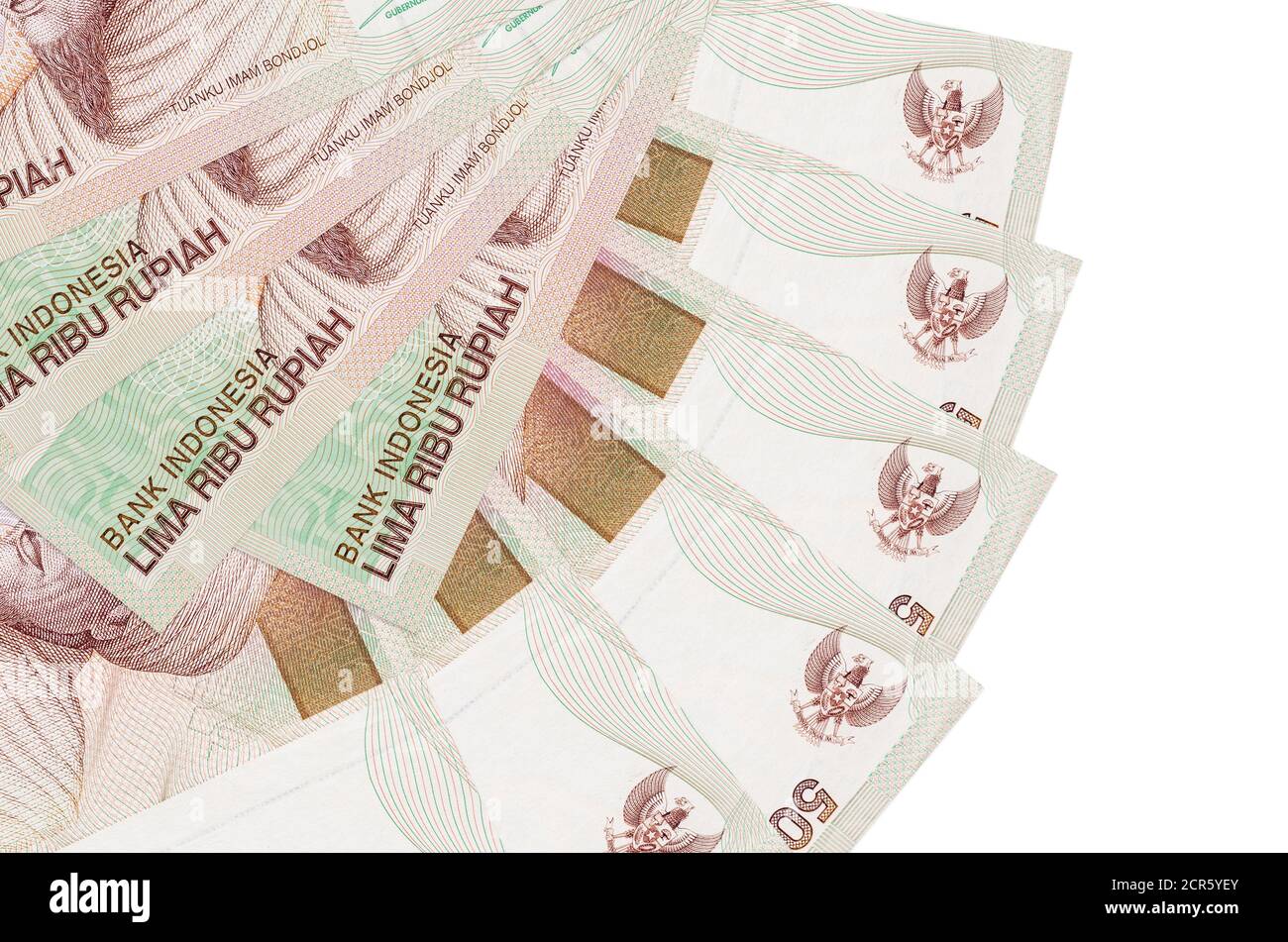 5000 Indonesian rupiah bills lies isolated on white background with ...