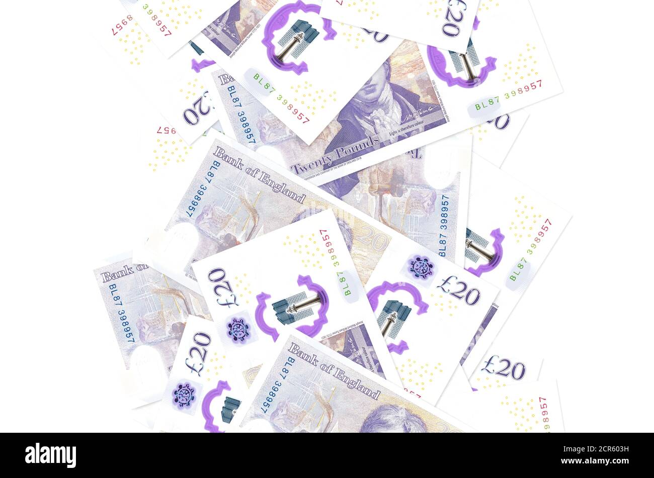 20 British pounds bills flying down isolated on white. Many banknotes ...