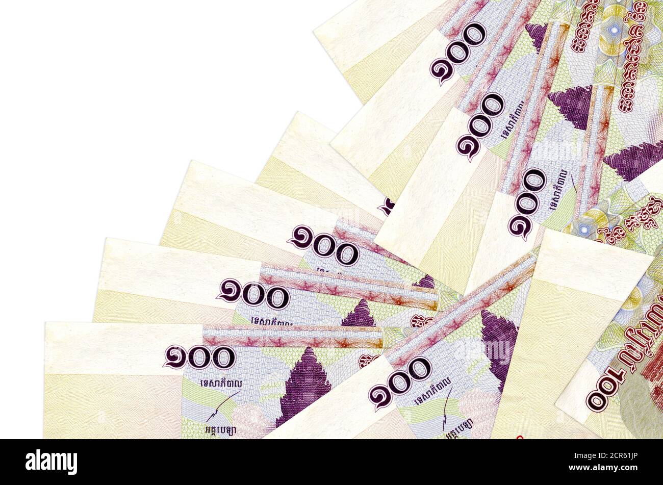 100 Cambodian riels bills lies in different order isolated on white ...