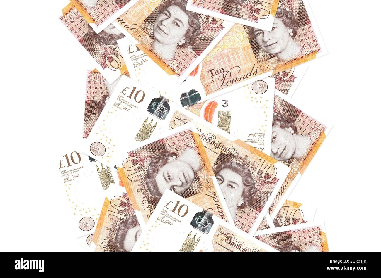 10 British pounds bills flying down isolated on white. Many banknotes ...