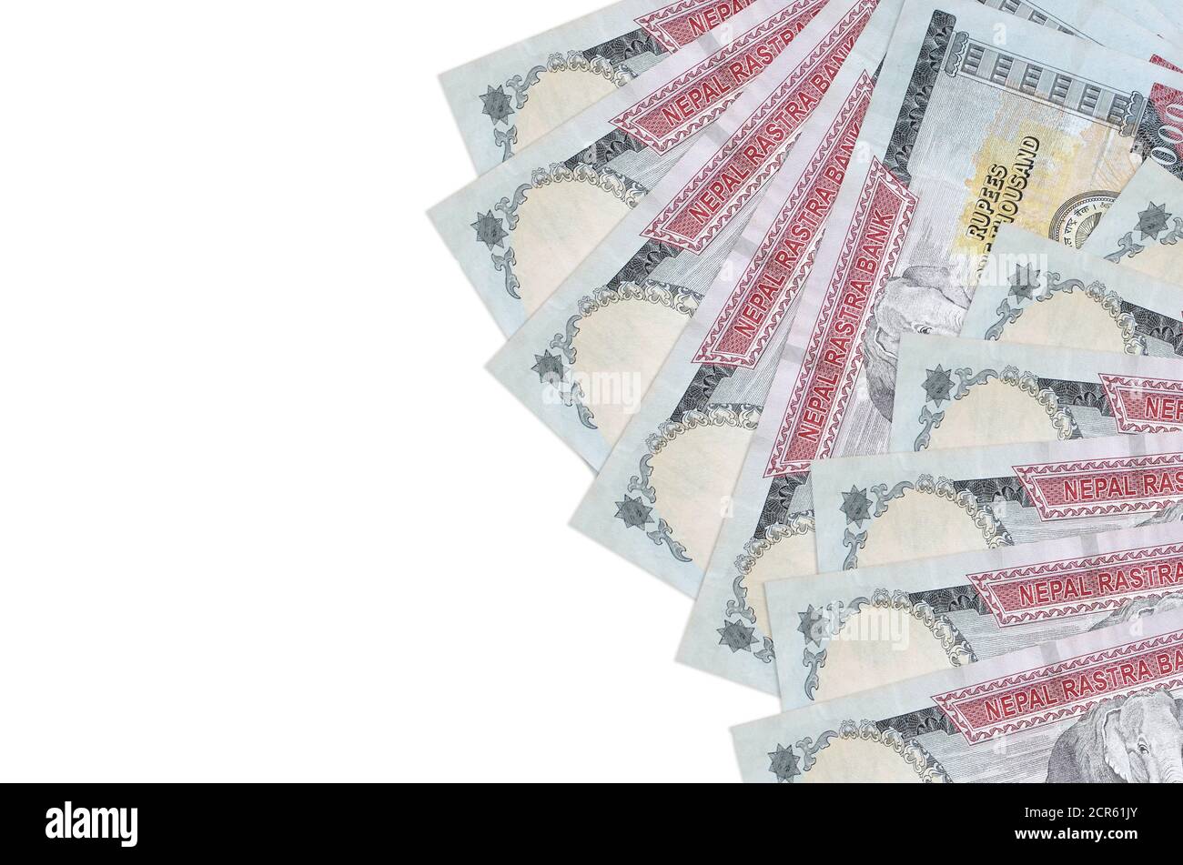 1000 Nepalese rupees bills lies isolated on white background with copy ...