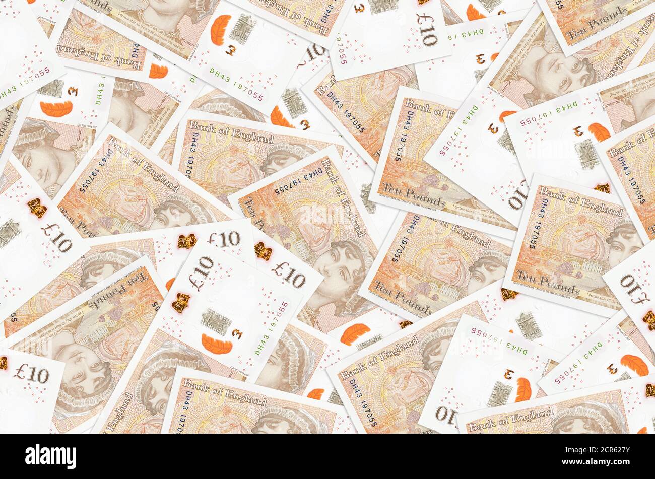 10 British pounds bills lies in big pile. Rich life conceptual ...