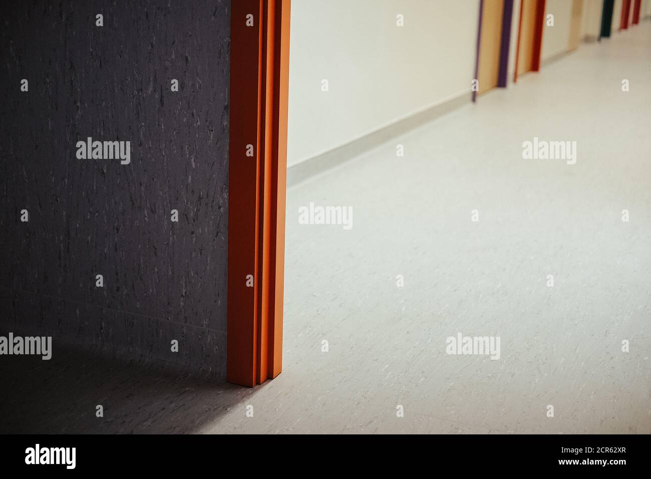 Orange door frame and a white floor Stock Photo - Alamy