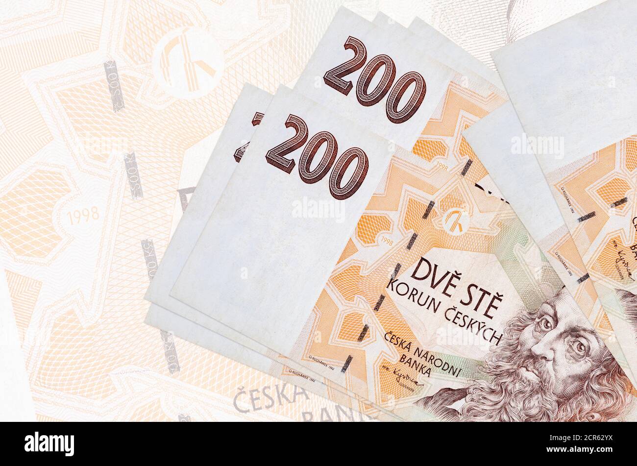 200 Czech korun bills lies in stack on background of big semi ...