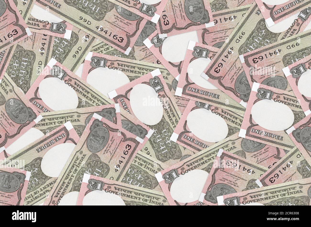 1 Indian rupee bills lies in big pile. Rich life conceptual background ...