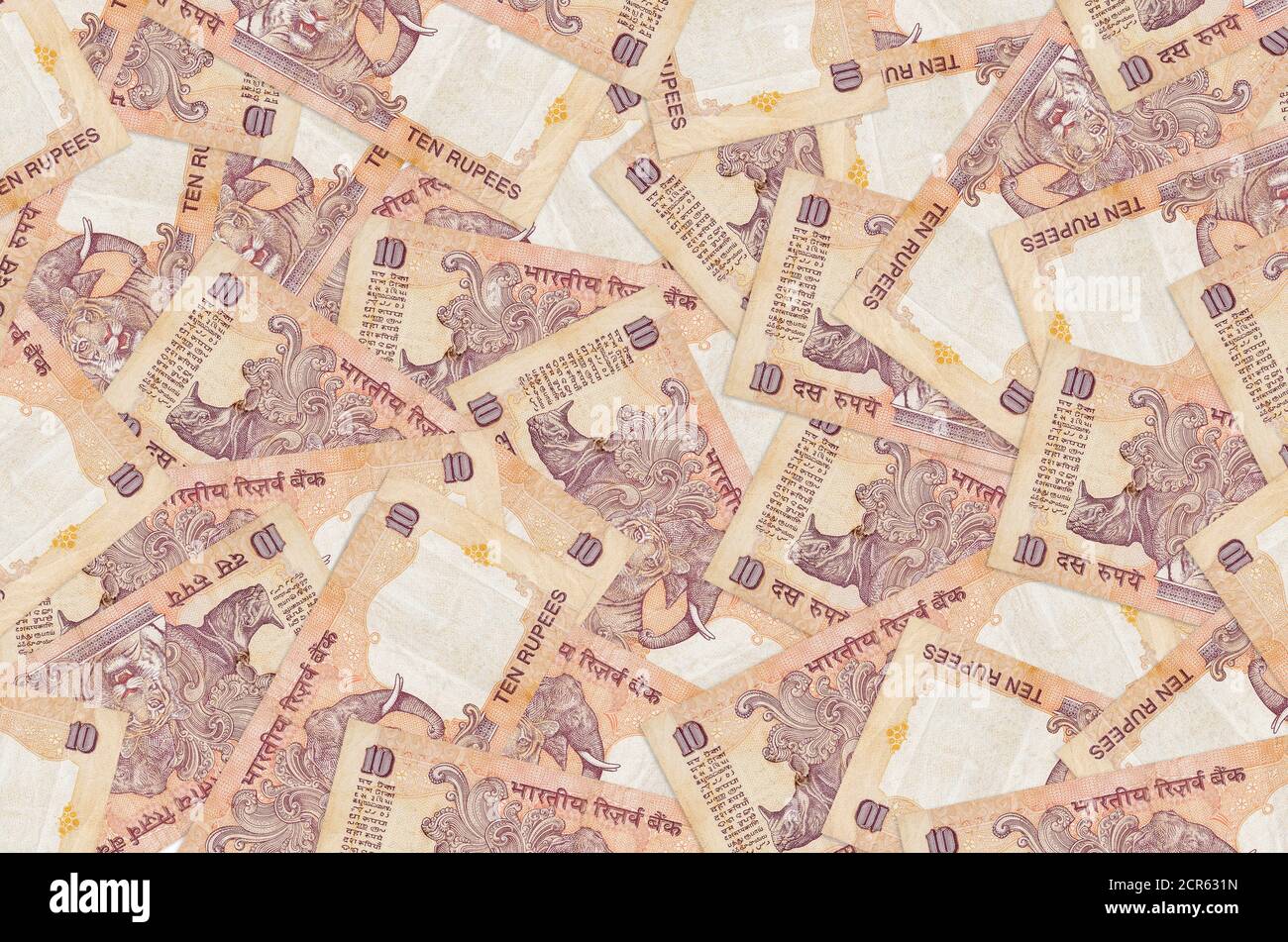 10 Indian rupees bills lies in big pile. Rich life conceptual ...