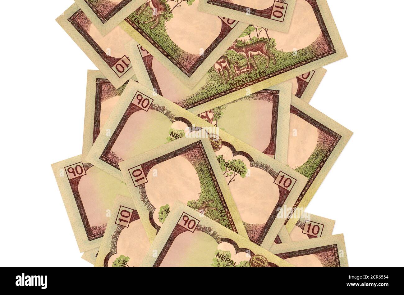 10 Nepalese rupees bills flying down isolated on white. Many banknotes ...