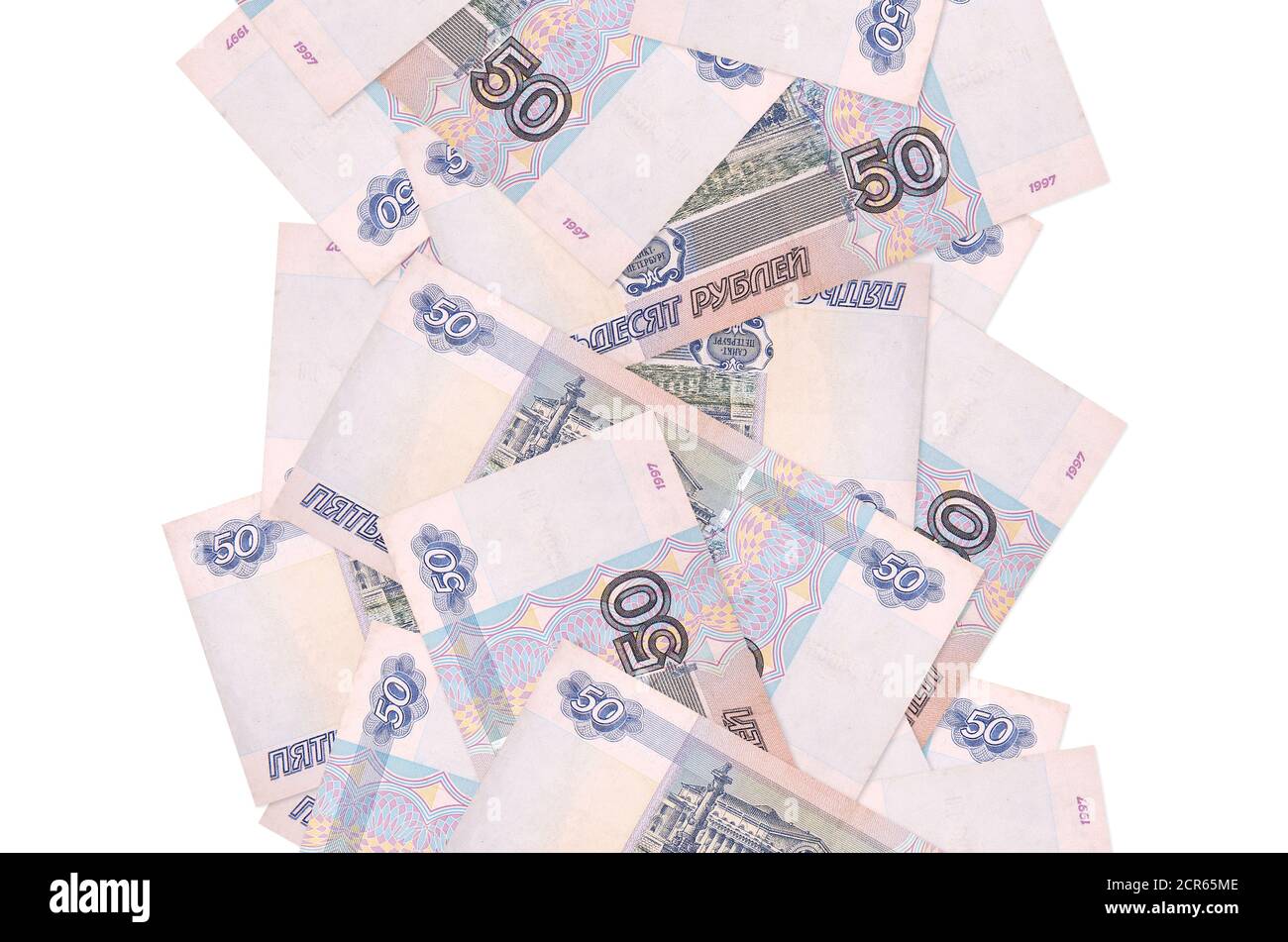 50 russian rubles bills flying down isolated on white. Many banknotes ...