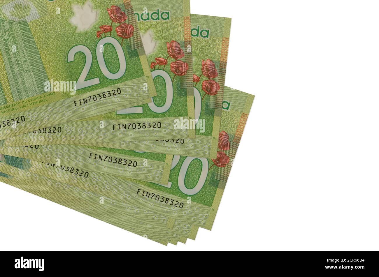 20 Canadian dollars bills lies in small bunch or pack isolated on white ...