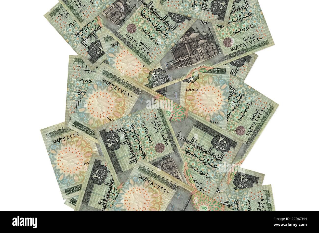 20 Egyptian pounds bills flying down isolated on white. Many banknotes ...