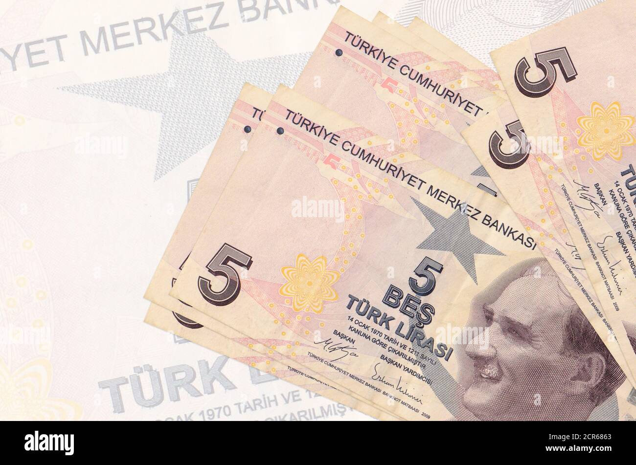 5 Turkish liras bills lies in stack on background of big semi ...