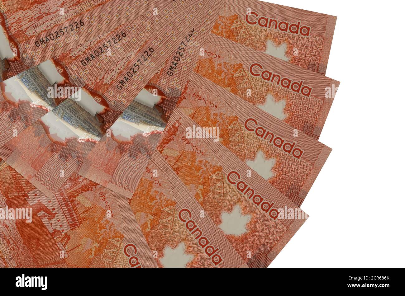 50 Canadian dollars bills lies isolated on white background with copy ...