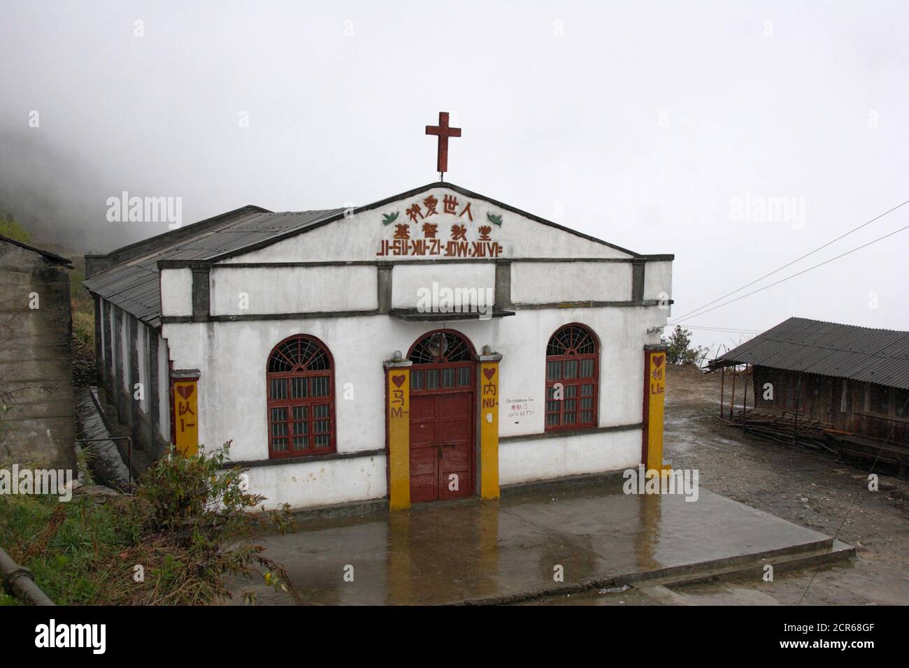 Protestant Church in misty mountains above Salween River, Yunnan ...