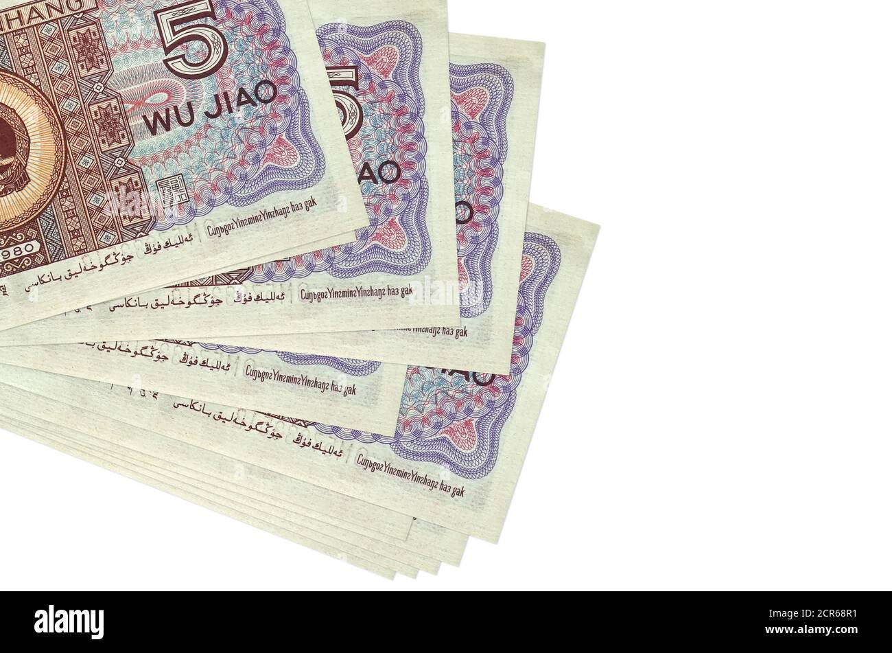 5 Chinese yuan bills lies in small bunch or pack isolated on white ...