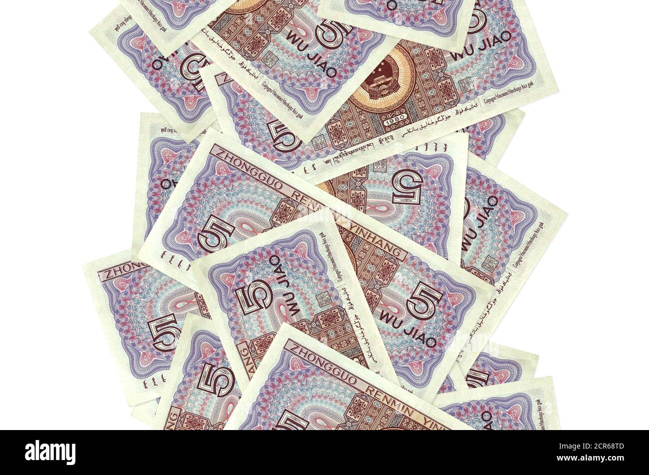 5 Chinese yuan bills flying down isolated on white. Many banknotes ...
