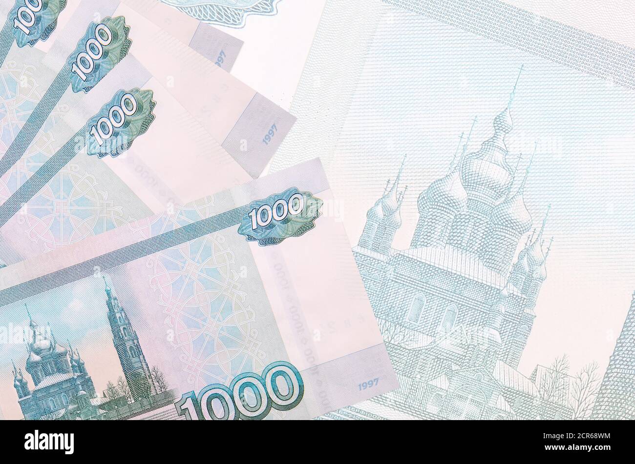 1000 russian rubles bills lies in stack on background of big semi ...