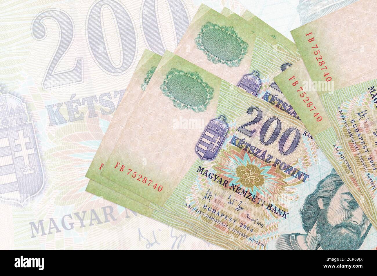 200 Hungarian forint bills lies in stack on background of big semi ...