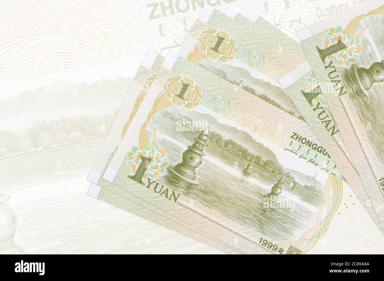 1 Chinese yuan bills lies in stack on background of big semi ...