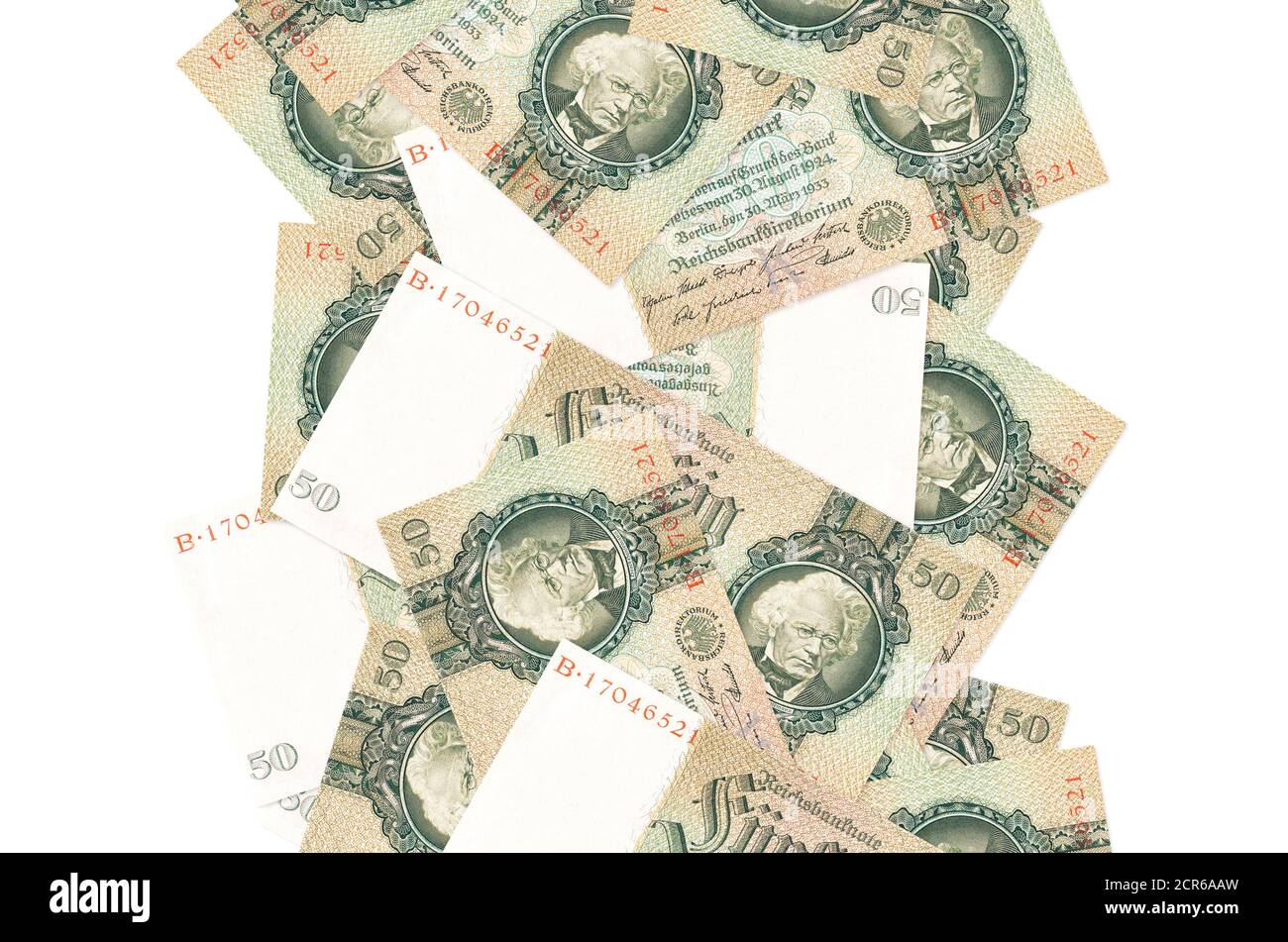 50 Reich marks bills flying down isolated on white. Many banknotes ...