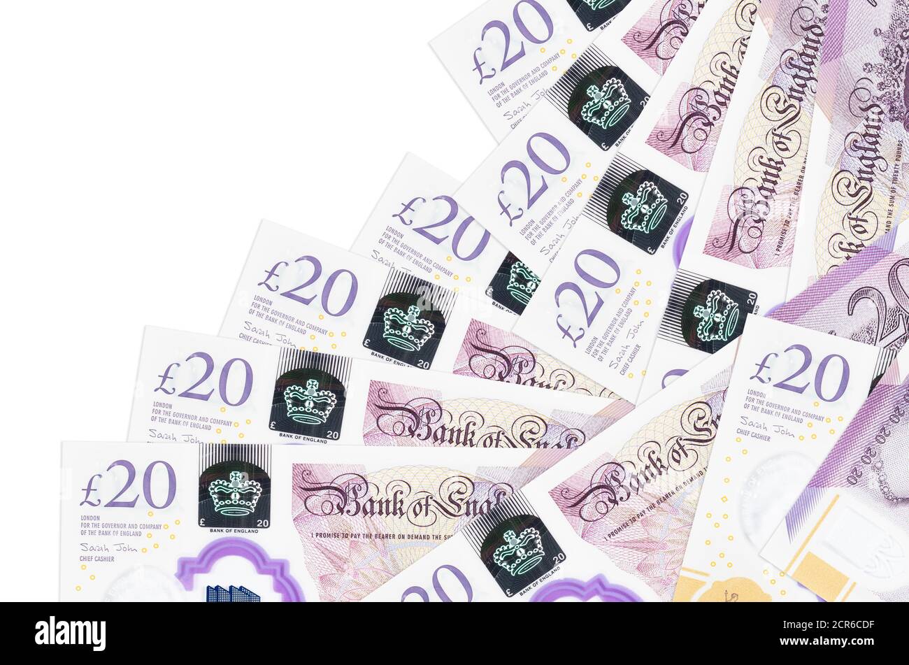 20 British pounds bills lies in different order isolated on white ...