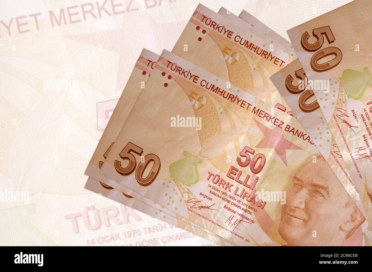 50 Turkish liras bills lies in stack on background of big semi ...