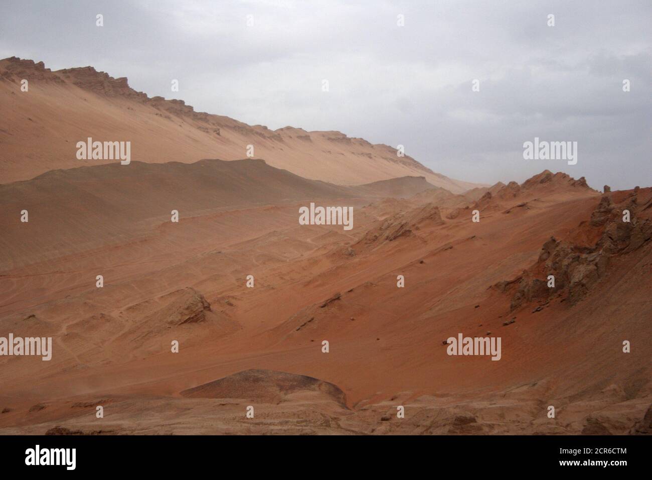 View of the Flaming Mountains, a desert landscape near near Bezeklik ...