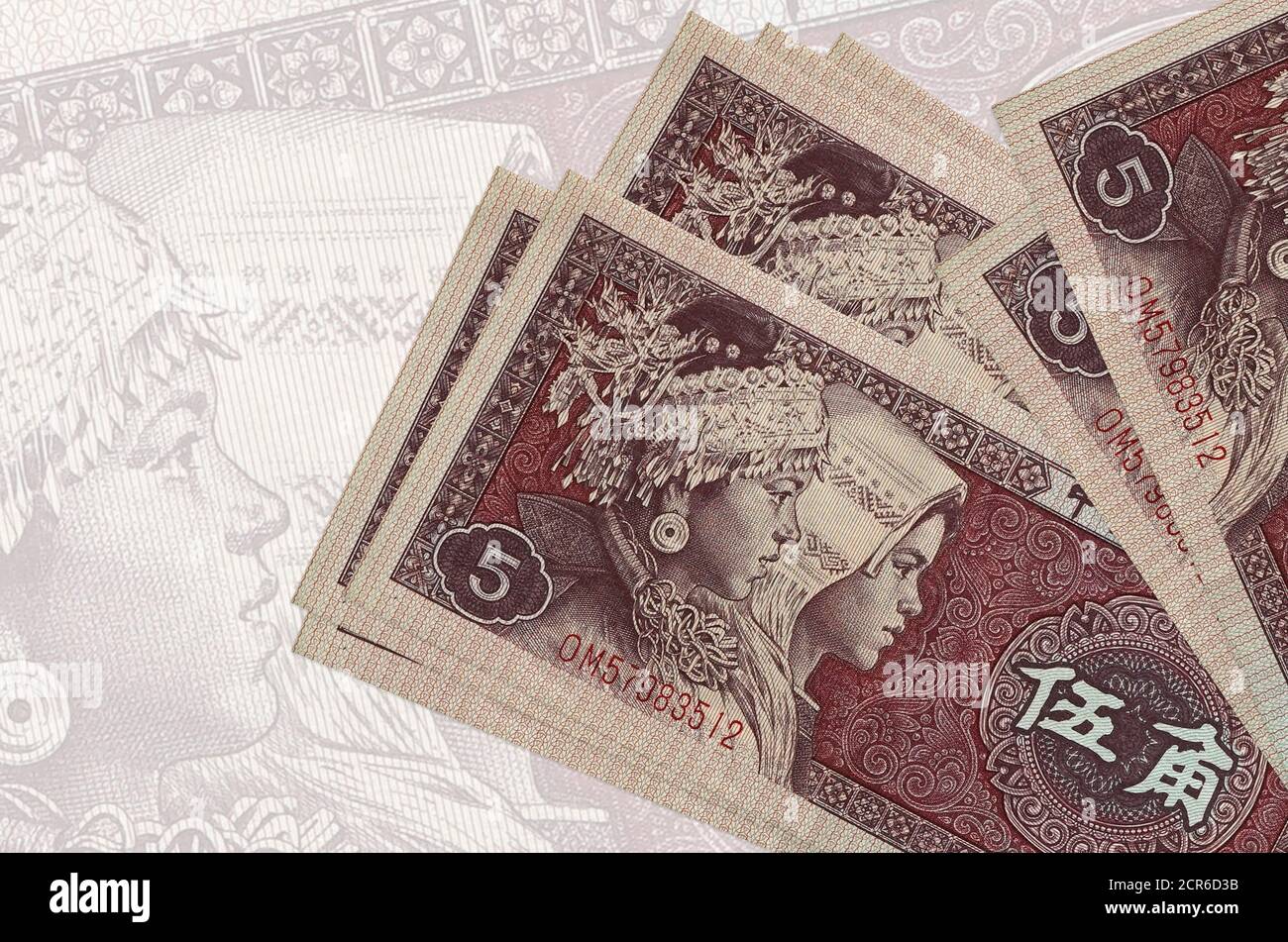 5 Chinese yuan bills lies in stack on background of big semi ...