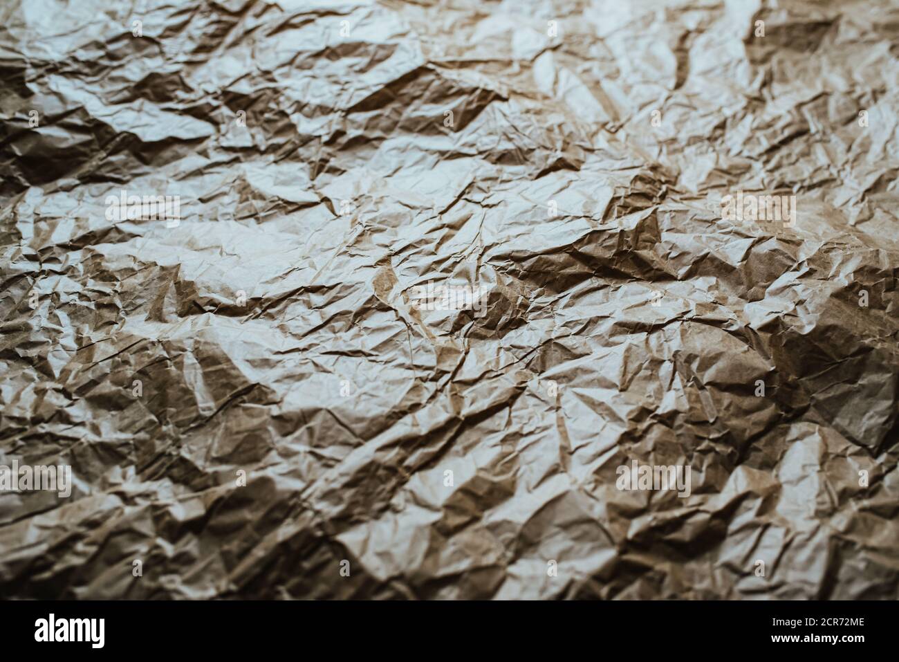Crumpled and expanded paper with natural packaging texture Stock Photo ...