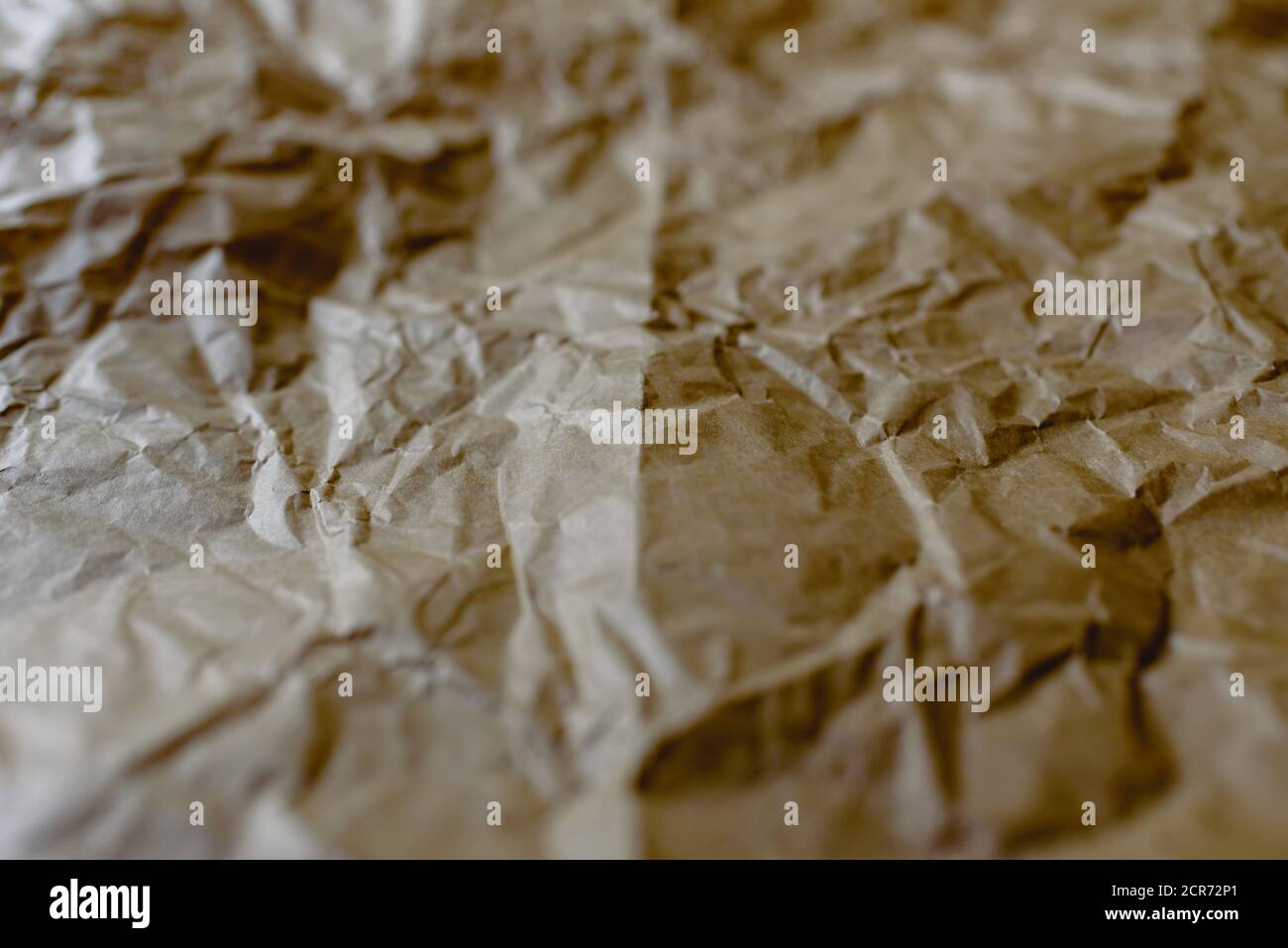 Crumpled and expanded paper with natural texture of reddish tones Stock ...