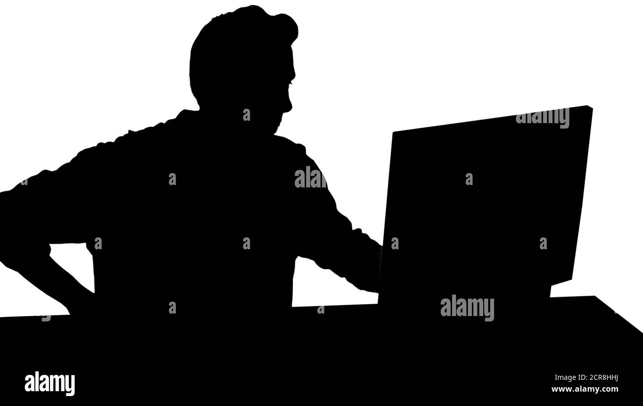 Silhouette Nervous man watching video games on a PC computer Stock ...