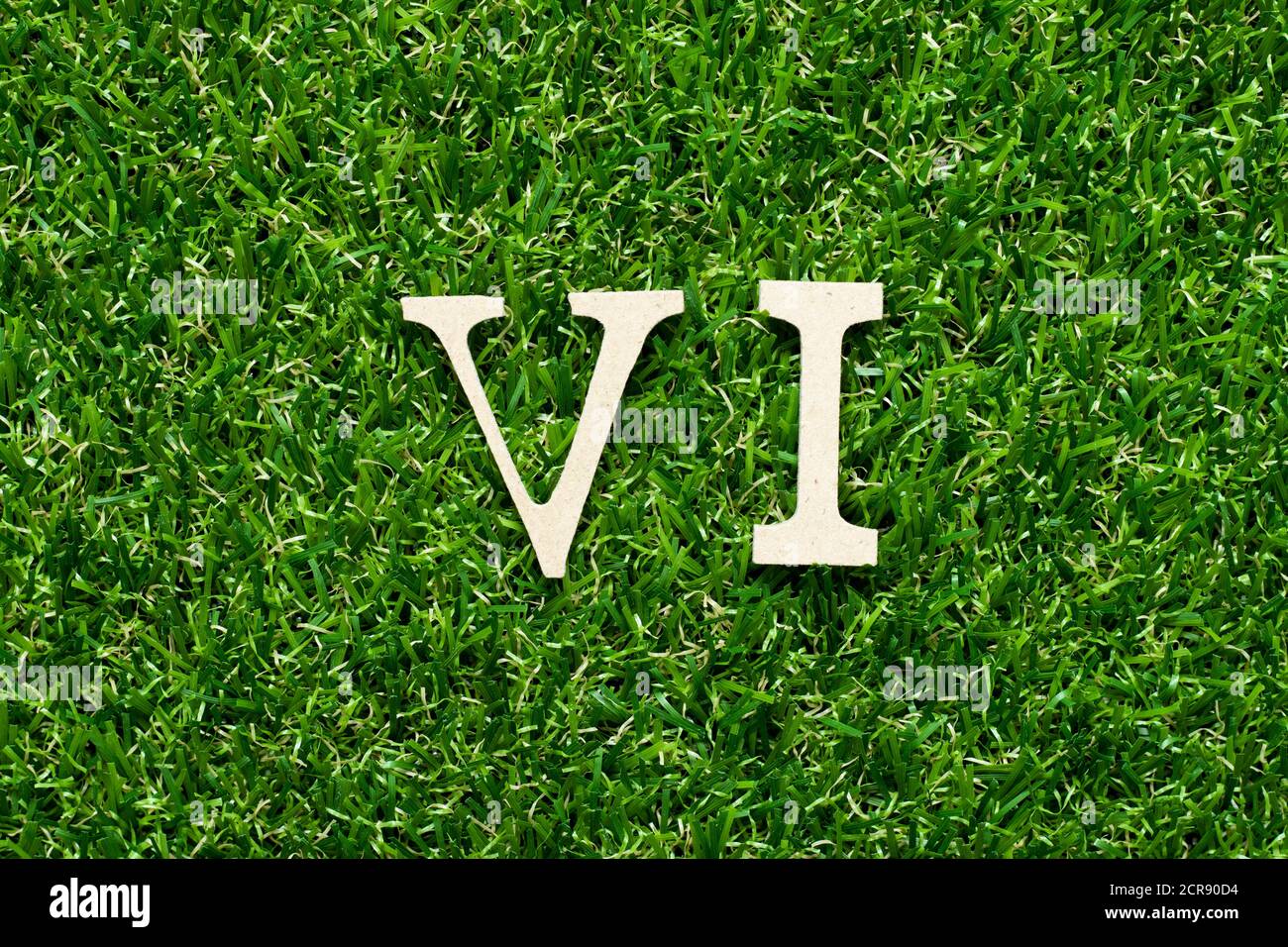 Wood alphabet letter in word VI (abbreviation for value investor) on ...