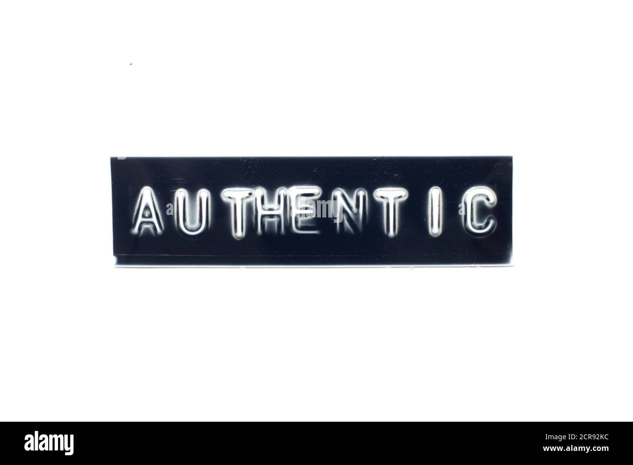 Embossed letter in word authentic on black banner with white background ...