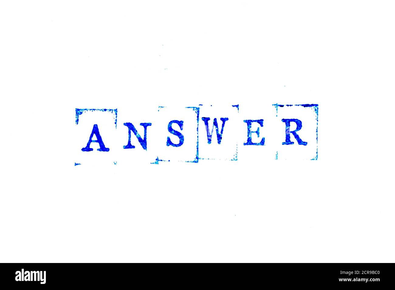 Blue color ink of rubber stamp in word answer on white paper background ...