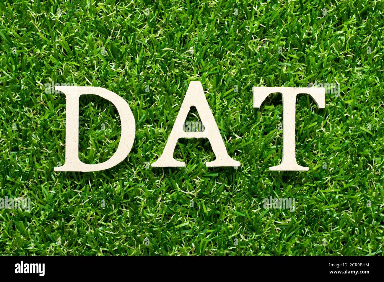 Wood alphabet letter in word DAT (Abbreviation of Delivery at Terminal ...