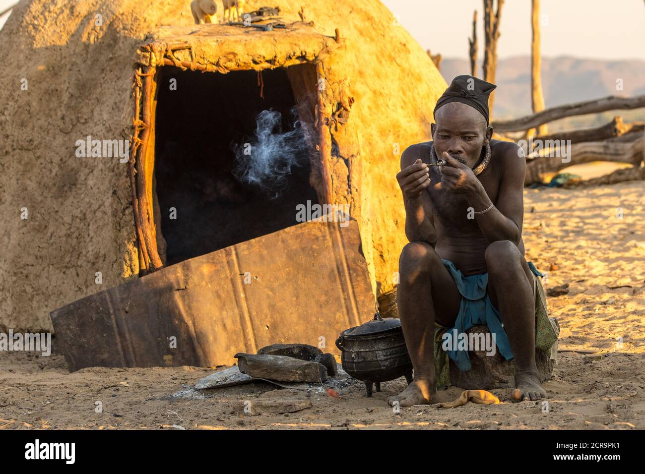 Man And Traditional Hut High Resolution Stock Photography and Images ...