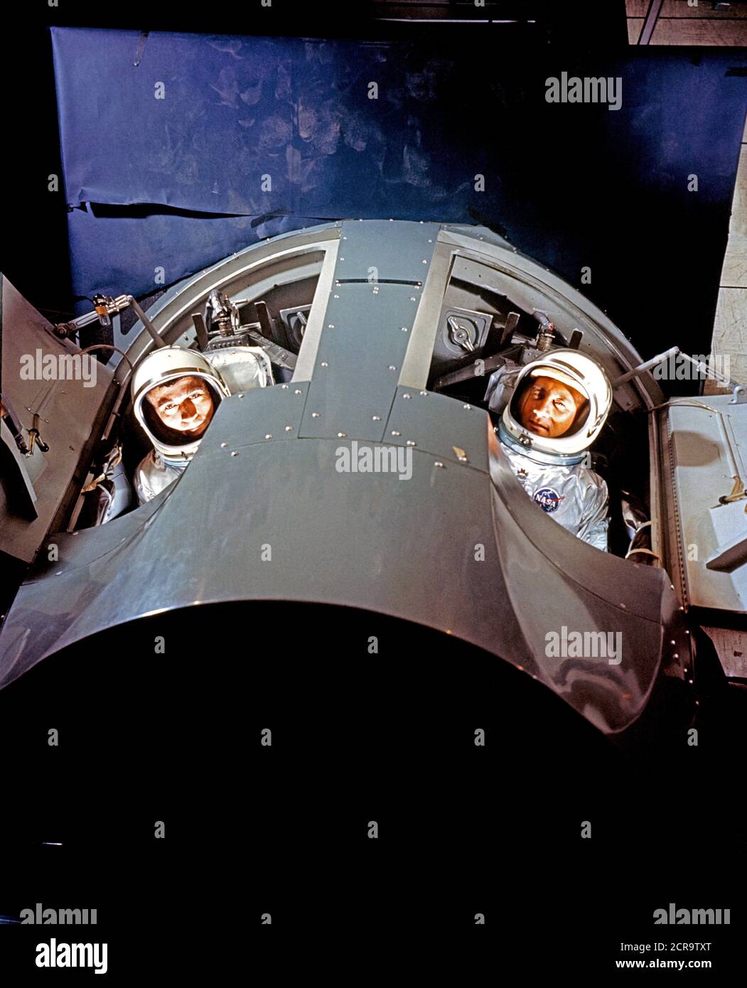 American astronauts inside space capsule Stock Photo - Alamy