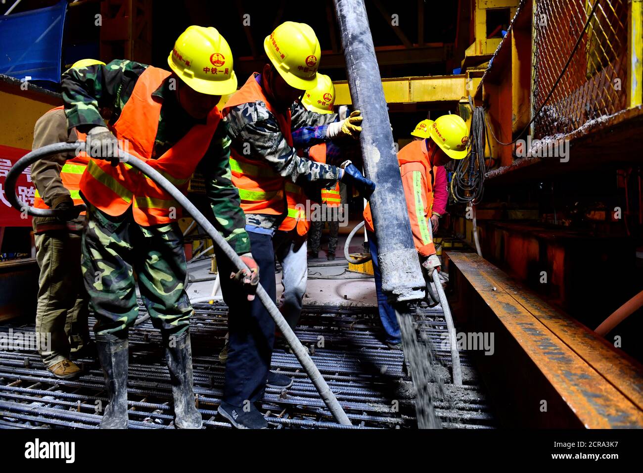 Jinan. 19th Sep, 2020. Workers join together two parts of an arch ...