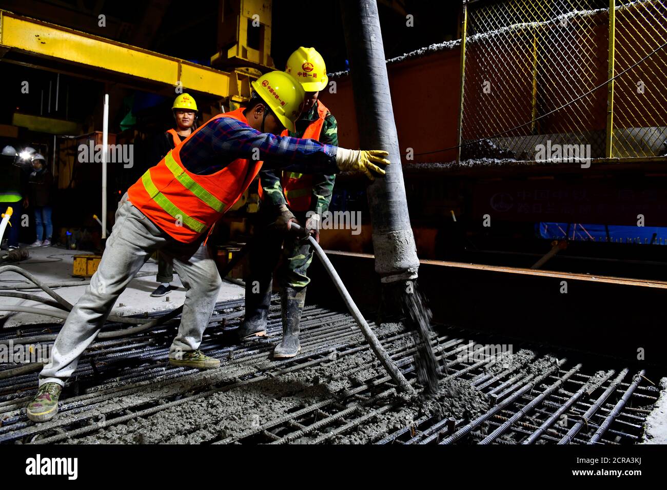 Jinan. 19th Sep, 2020. Workers join together two parts of an arch ...