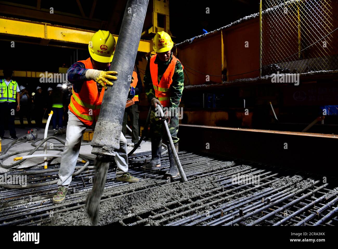 Jinan. 19th Sep, 2020. Workers join together two parts of an arch ...