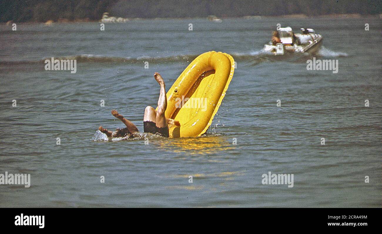 Man falling off raft hi-res stock photography and images - Alamy