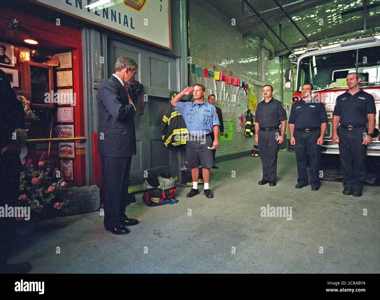 President George W. Bush visits with firefighters Wednesday, Oct. 3 ...