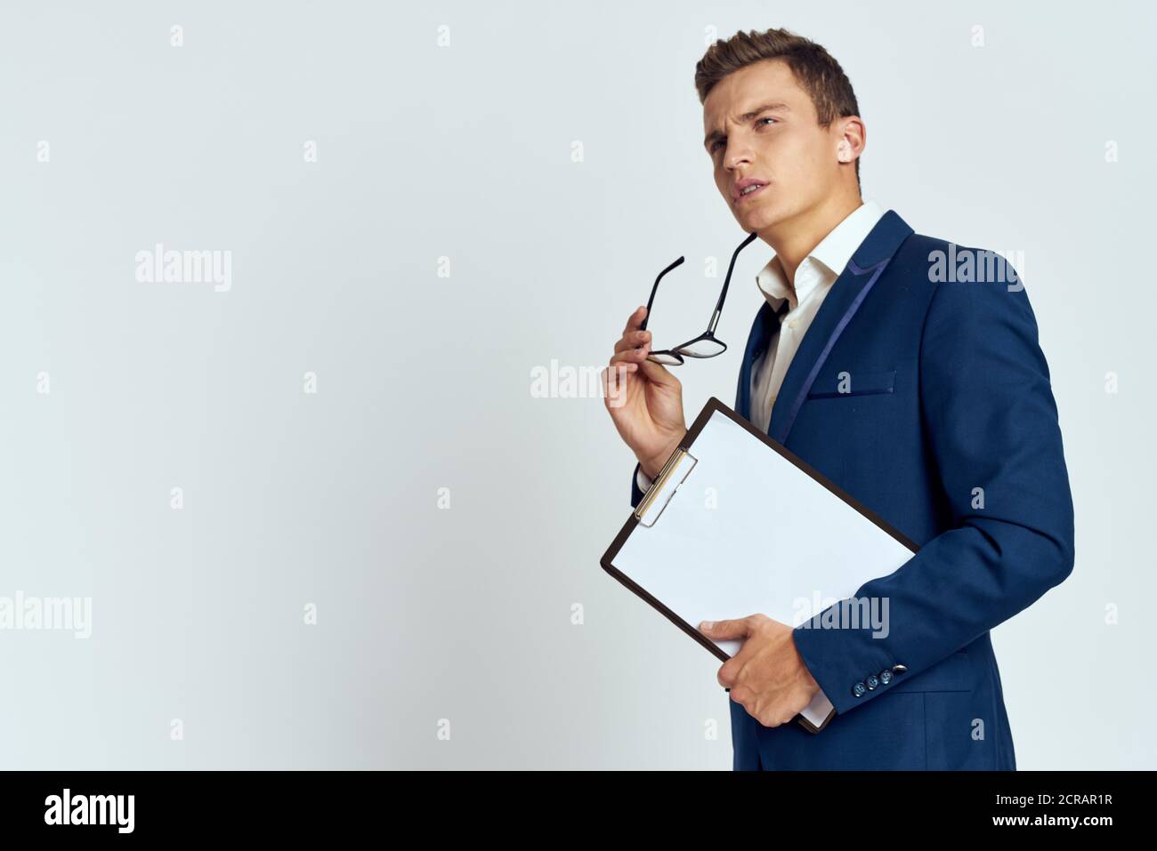 Businesswoman in suit glasses holding office documents self-confidence ...