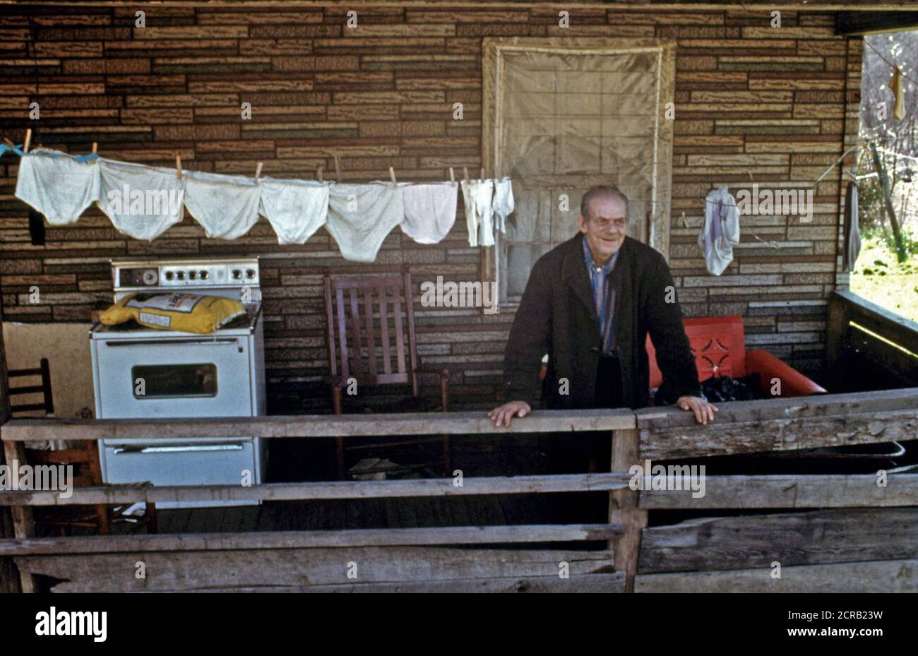 Old man on porch 1970s hi-res stock photography and images - Alamy