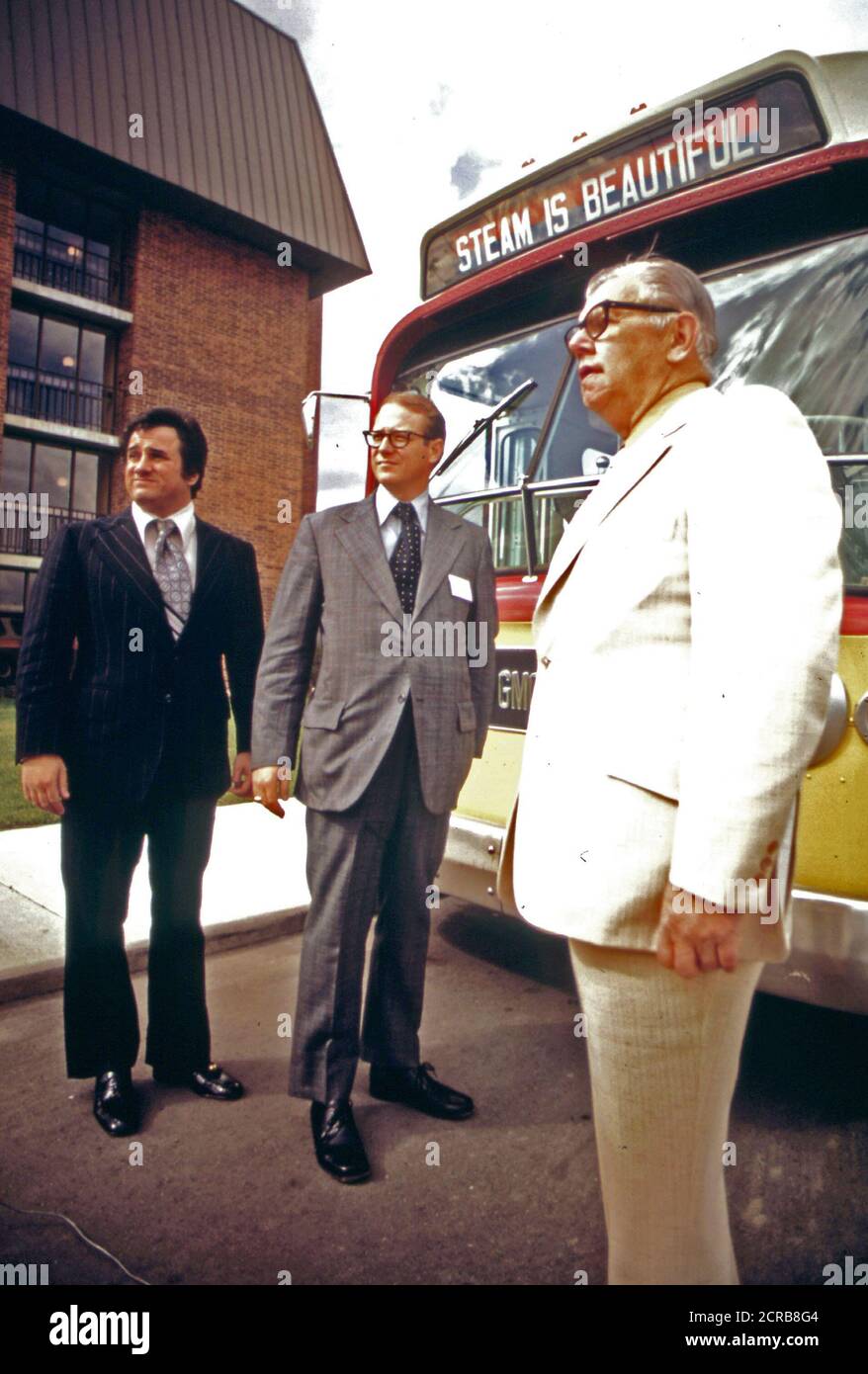 Mr. William Lear (White Suit) and Officials of His Company During a ...