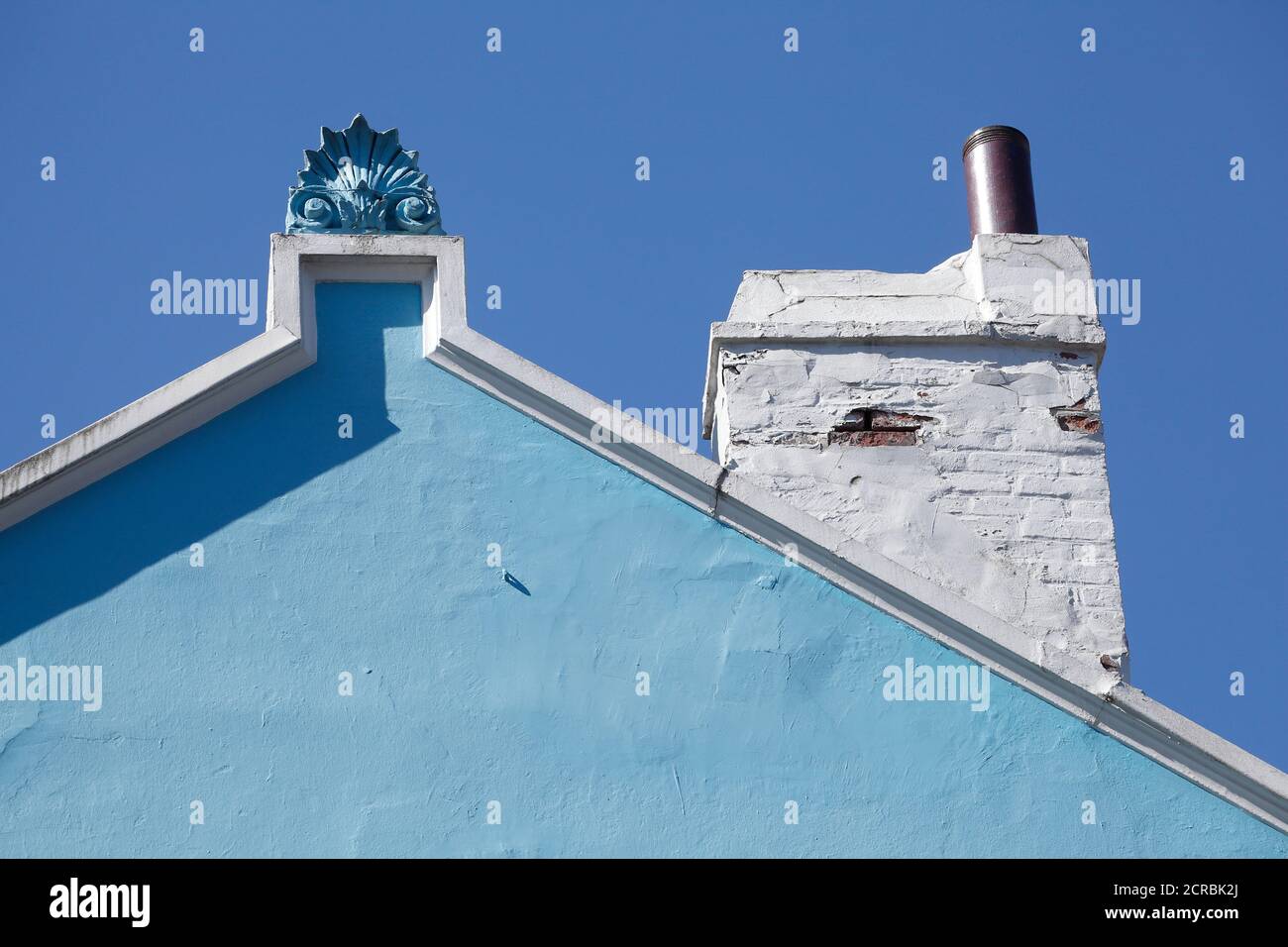 Roof, white chimney, blue house wall, roof edge, blue sky, Bremen ...