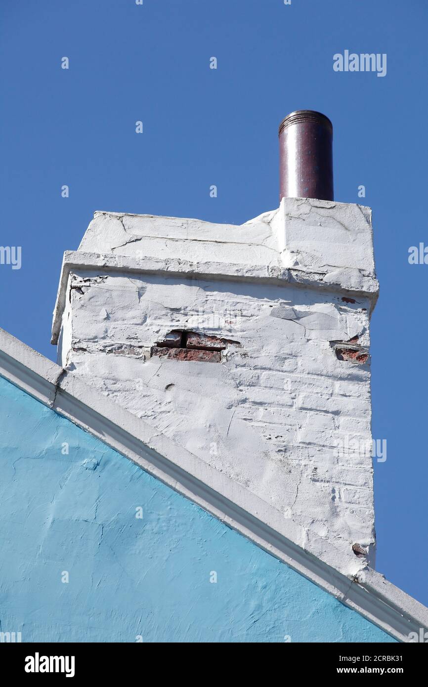 Roof, white chimney, blue house wall, roof edge, blue sky, Bremen ...