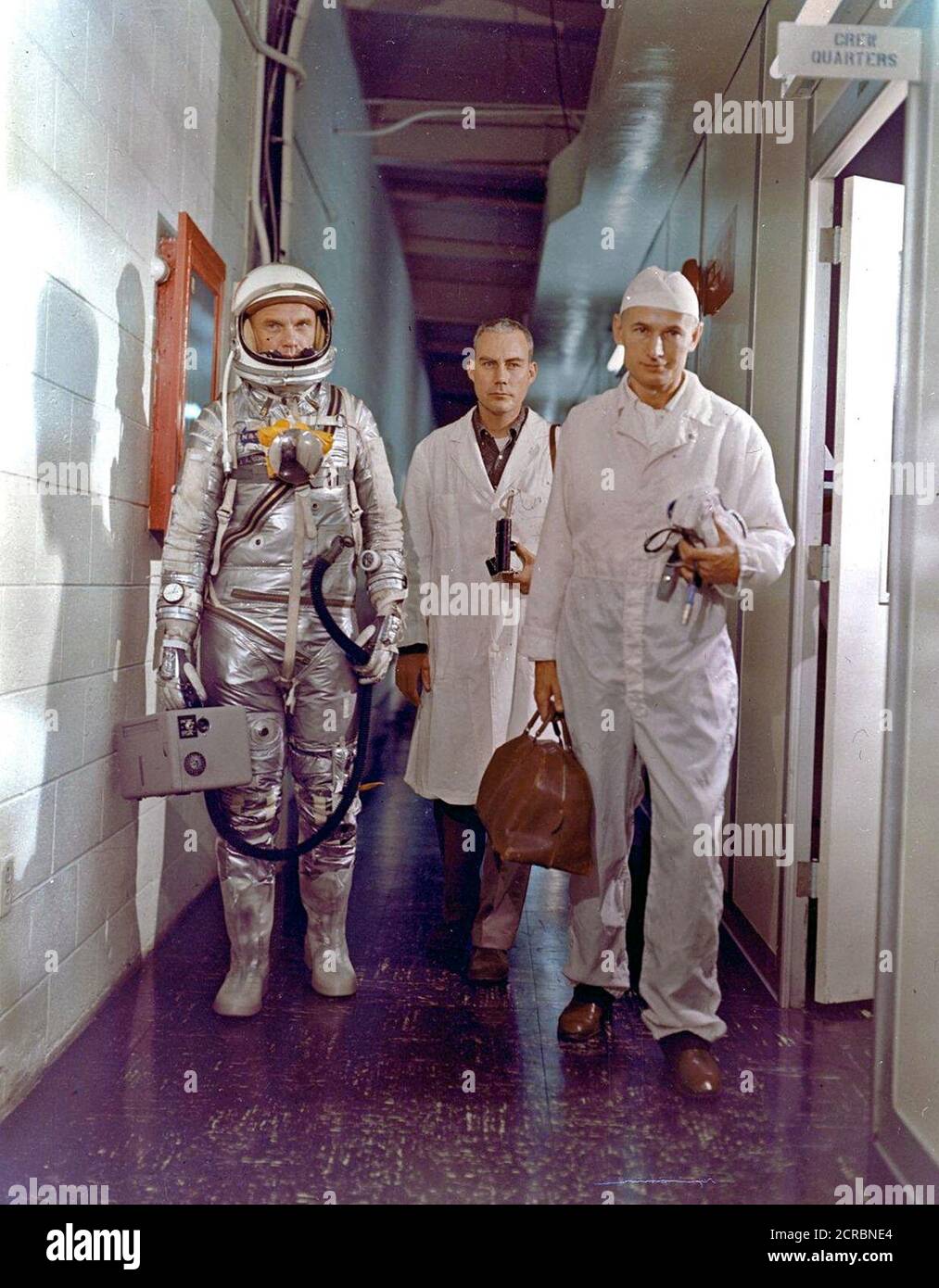 Astronaut John H. Glenn Jr., NASA flight surgeon William Douglas and ...